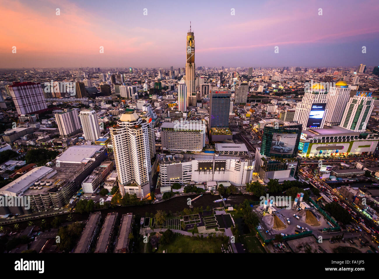 View of modern skyscrapers in Siam at sunset, in Bangkok, Thailand ...