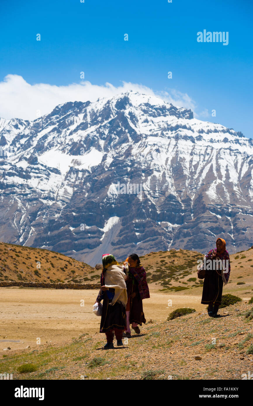 Buddhist pilgrims walking on pilgrimage among the Himalayan mountains ...