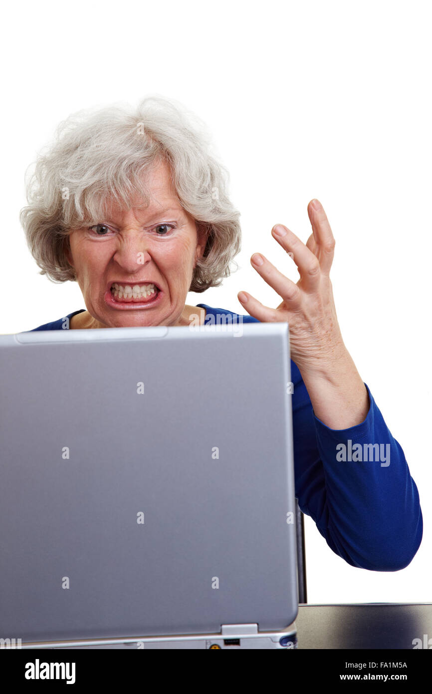 Angry old woman screaming at her laptop Stock Photo - Alamy