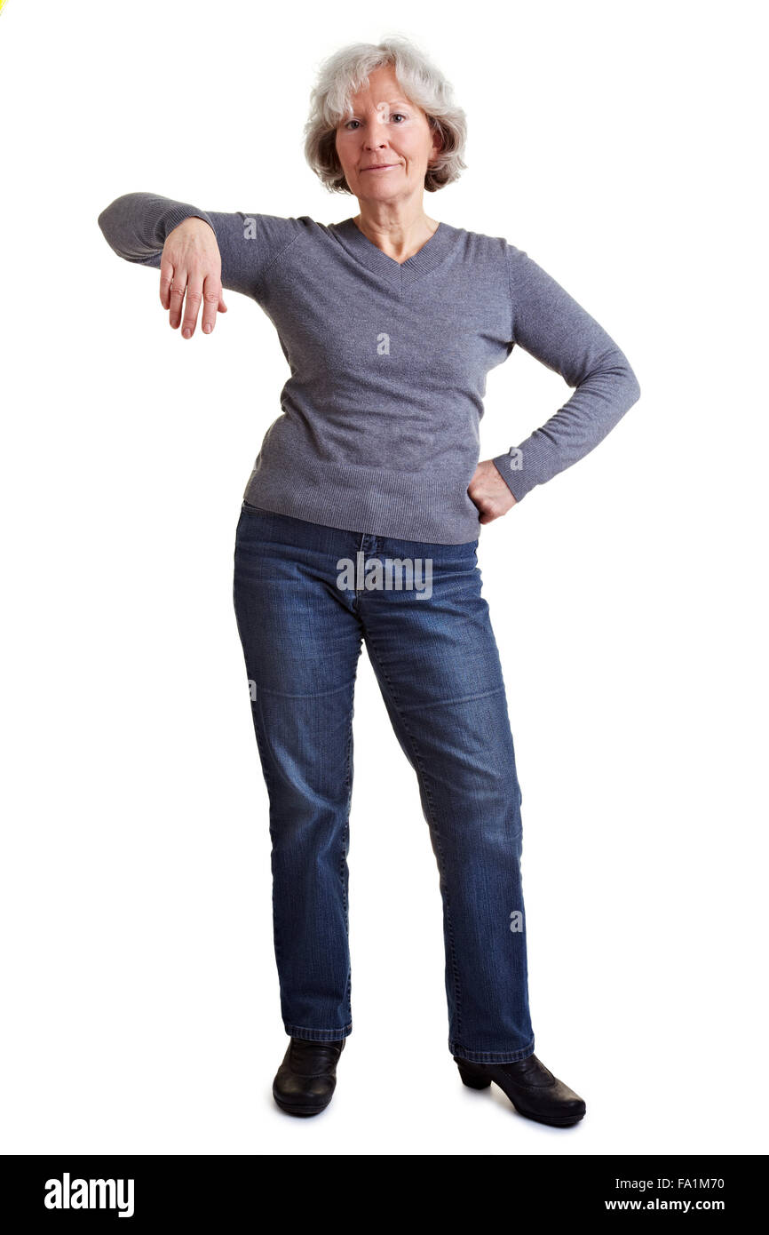 Old senior woman leaning on an imaginary object Stock Photo - Alamy