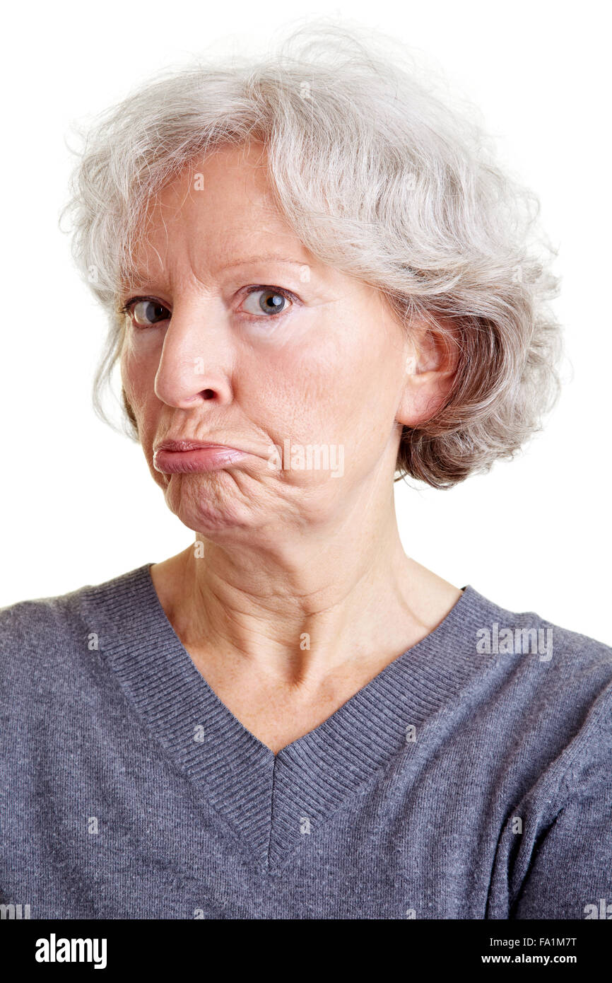 Old senior woman grimacing with her face Stock Photo - Alamy