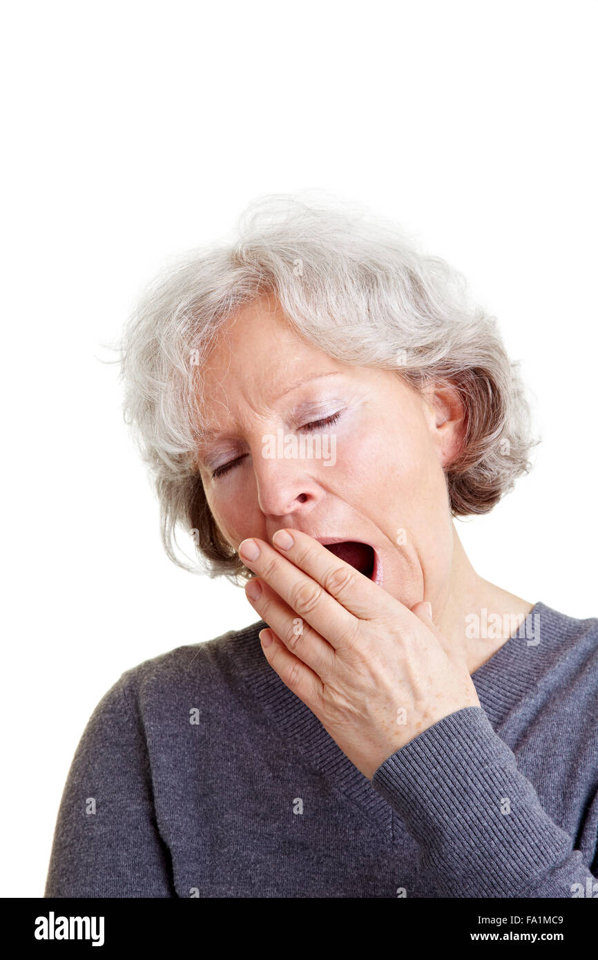 Portrait sleepy old woman yawning hi-res stock photography and images ...