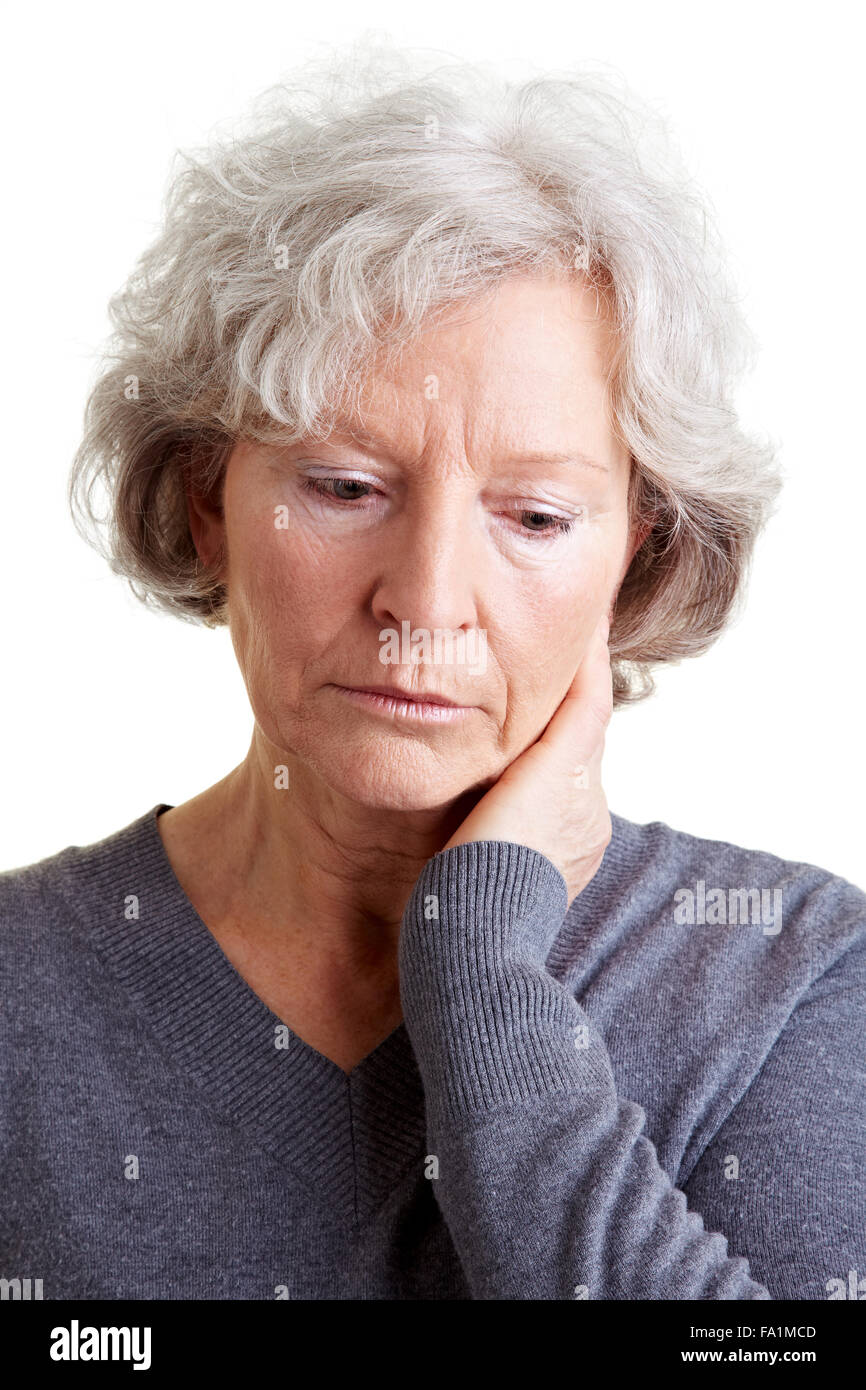 Sad old senior woman looking down and crying Stock Photo - Alamy