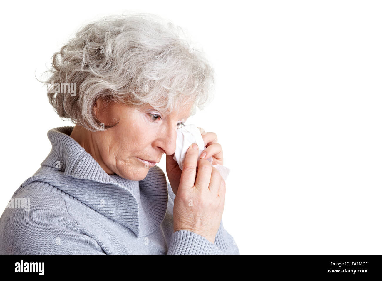 Old senior woman crying and drying her tears with a handkerchief Stock ...