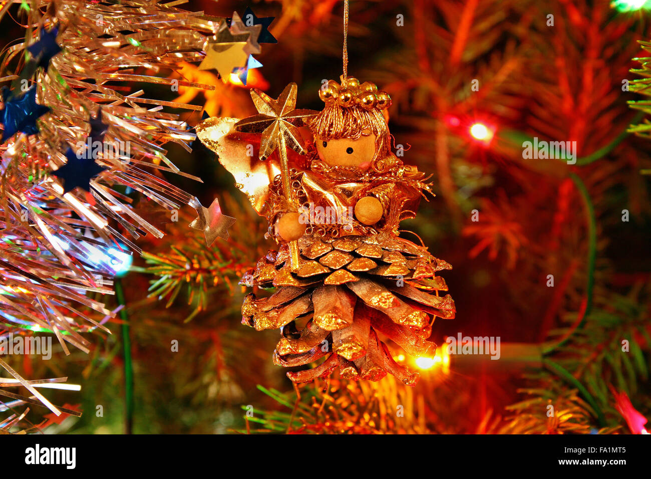 Shining lights and angel on the Christmas tree Stock Photo - Alamy