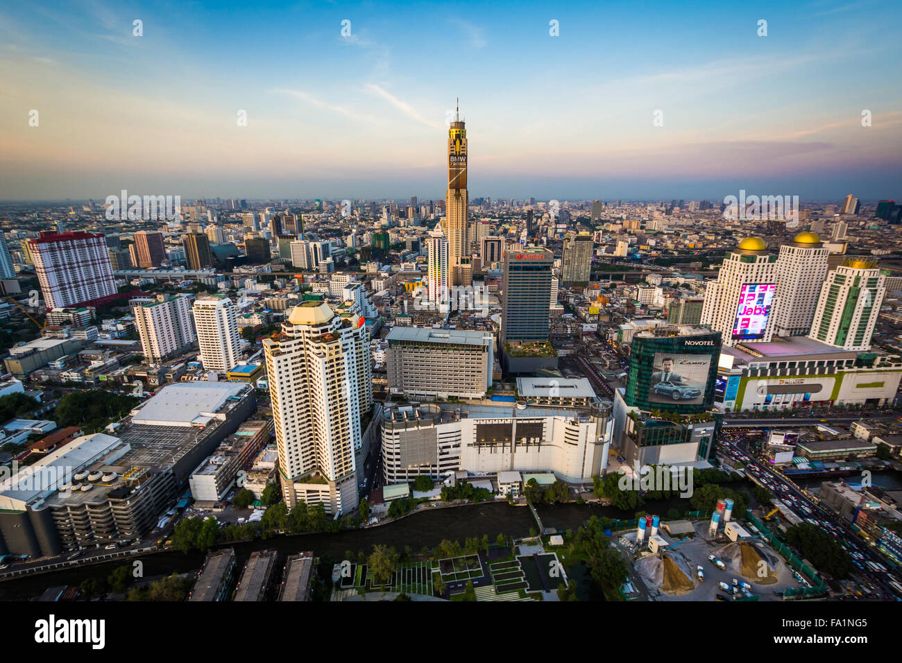 View of modern skyscrapers in Siam at sunset, in Bangkok, Thailand ...