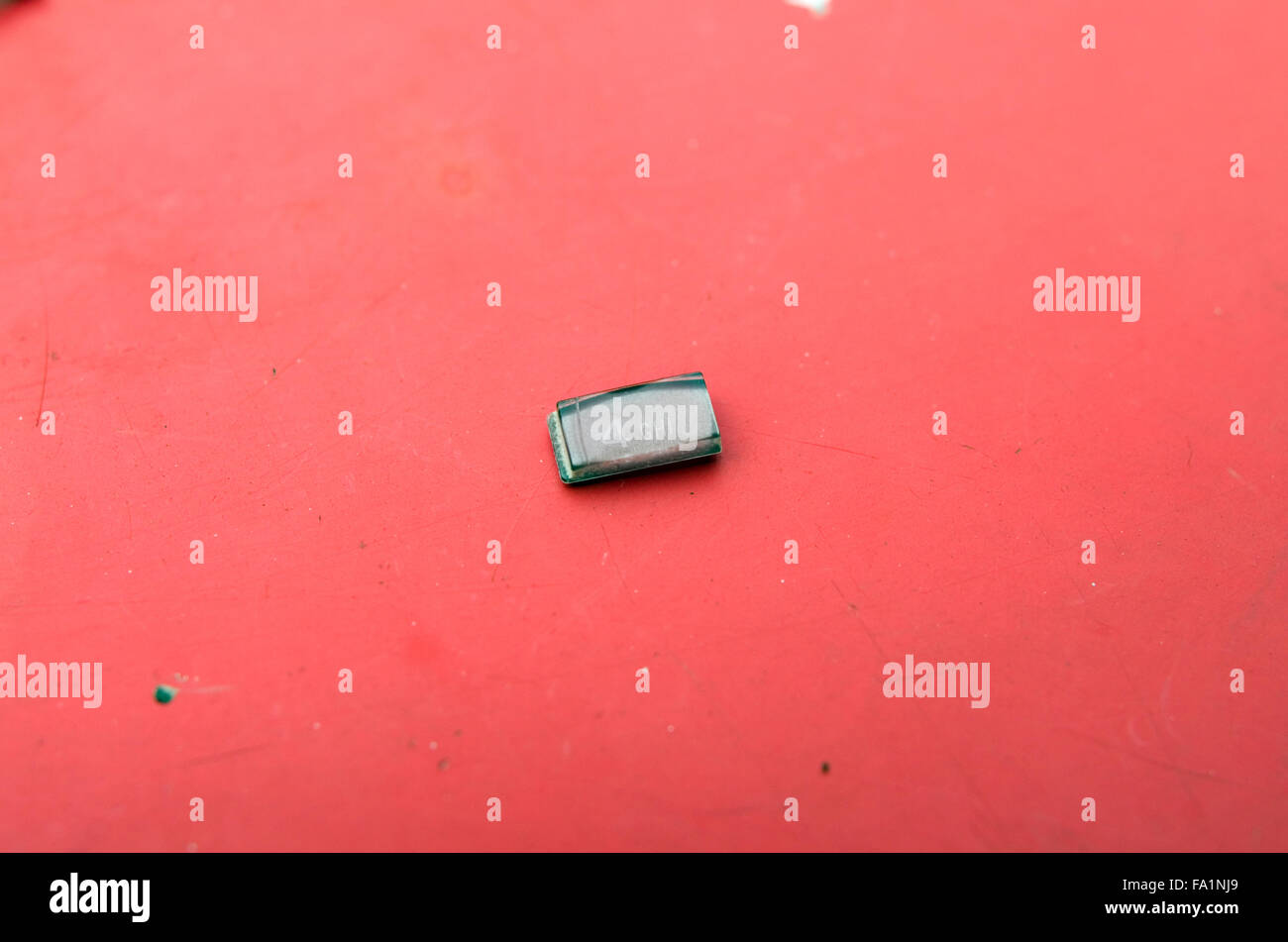 Broken number 4 key from a mobile phone on a red background Stock Photo ...