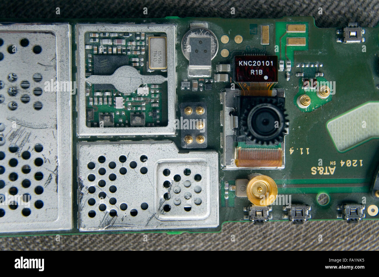A pile of broken pieces of mobile phones and phone batteries Stock ...