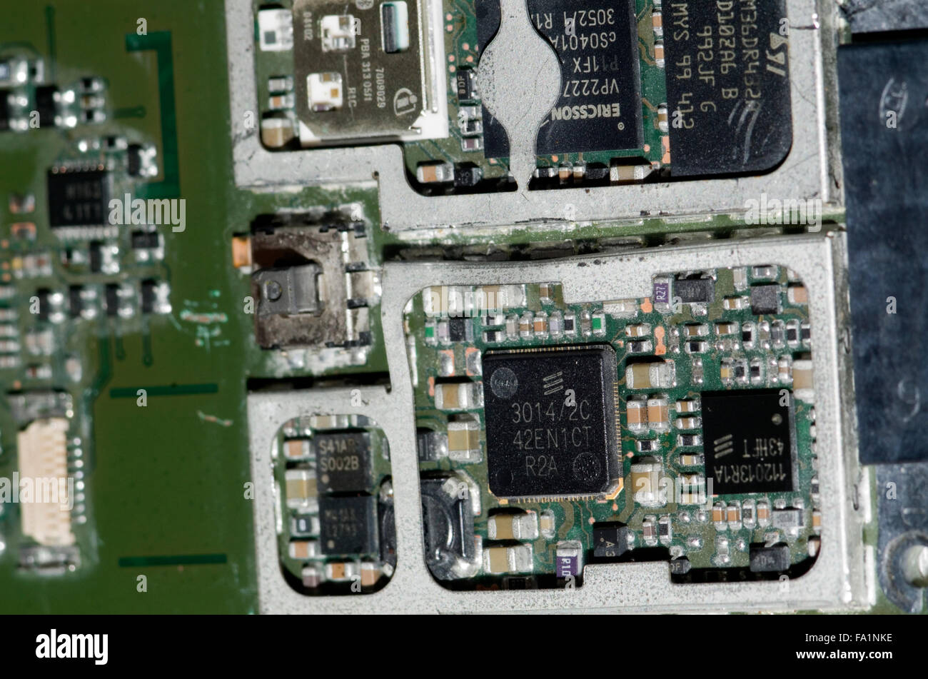 A pile of broken pieces of mobile phones and phone batteries Stock ...