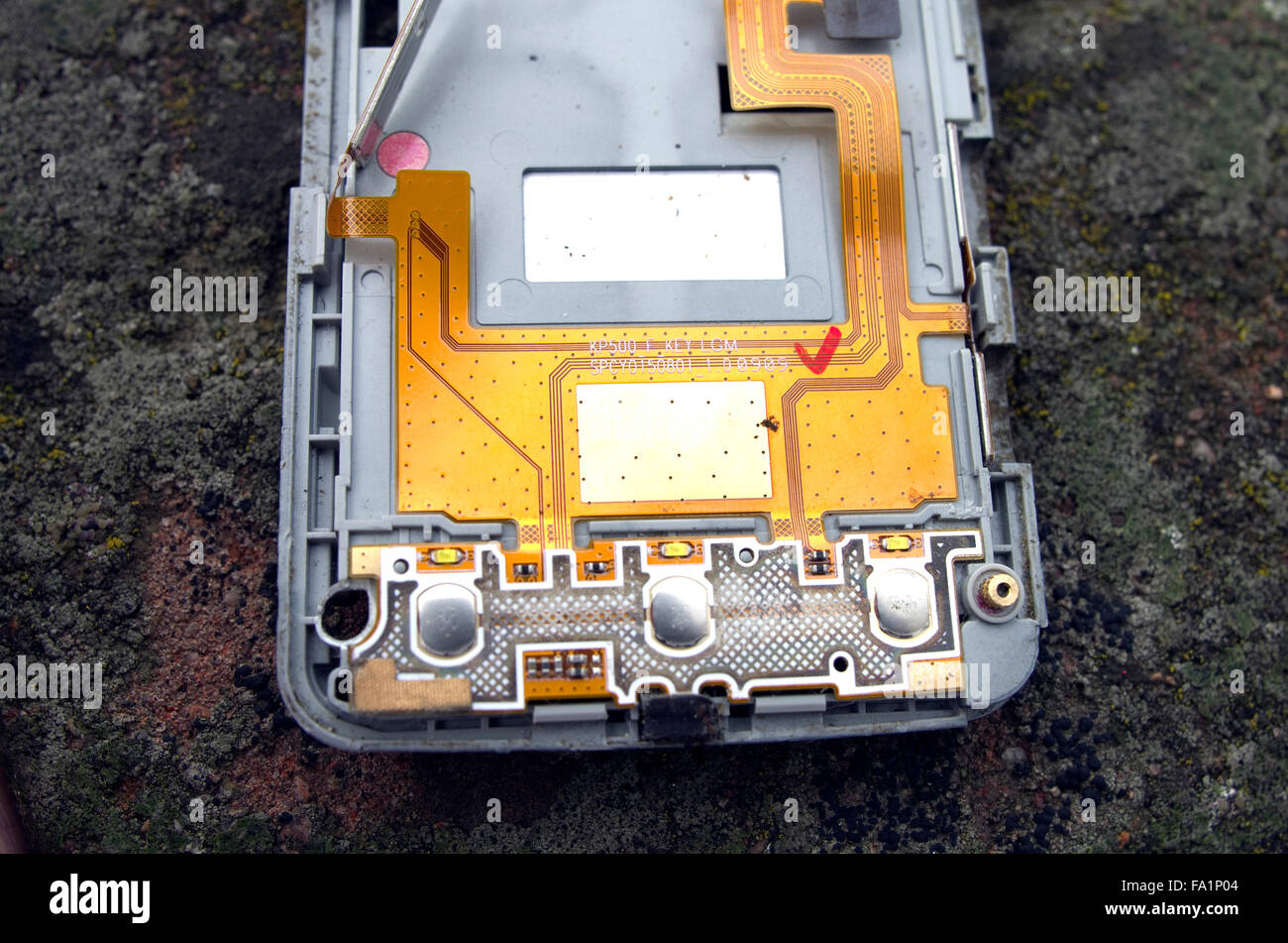 A pile of broken pieces of mobile phones and phone batteries Stock ...