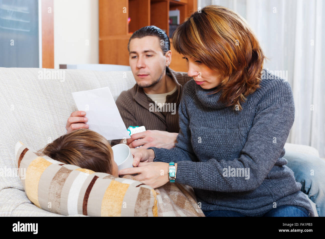 Caring parents teenager hi-res stock photography and images - Alamy
