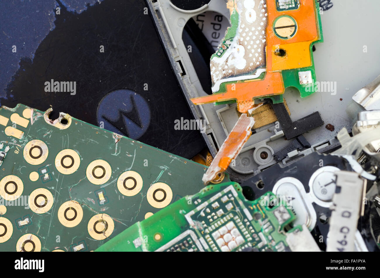 A pile of broken pieces of mobile phones and phone batteries Stock ...