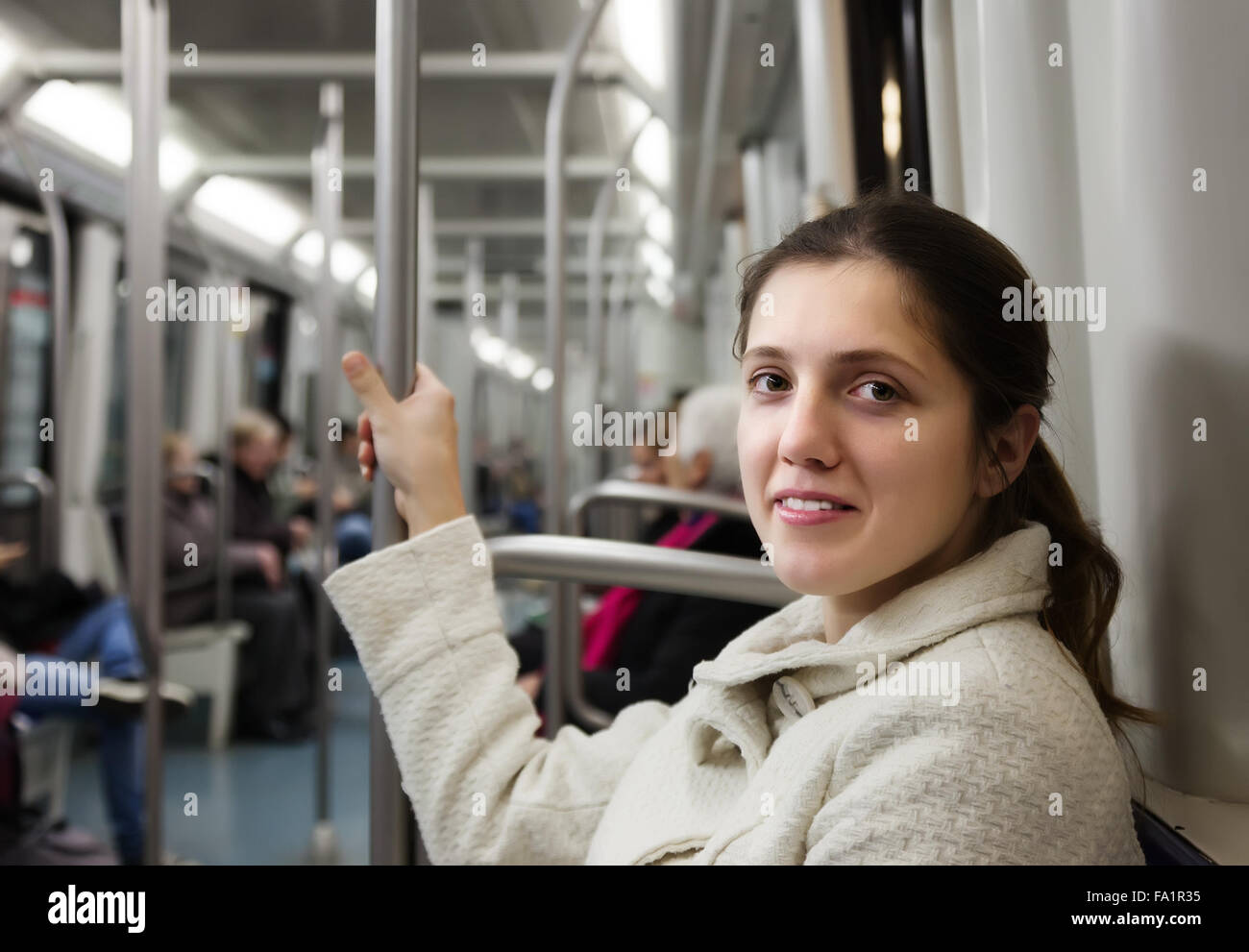 Female passenger in subway train at metro Stock Photo - Alamy