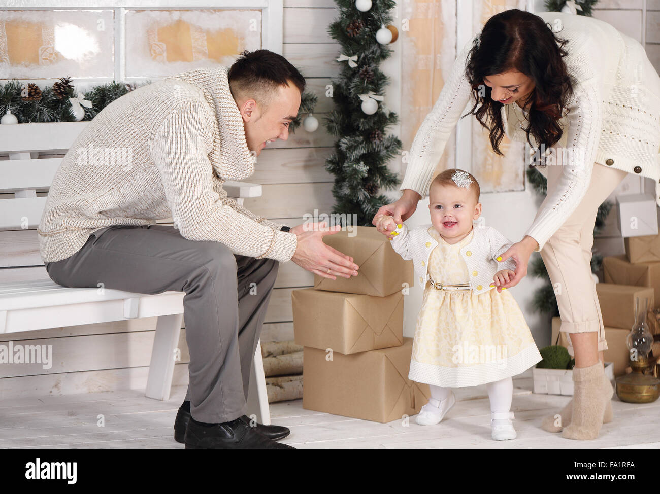 Happy family, first steps Stock Photo - Alamy