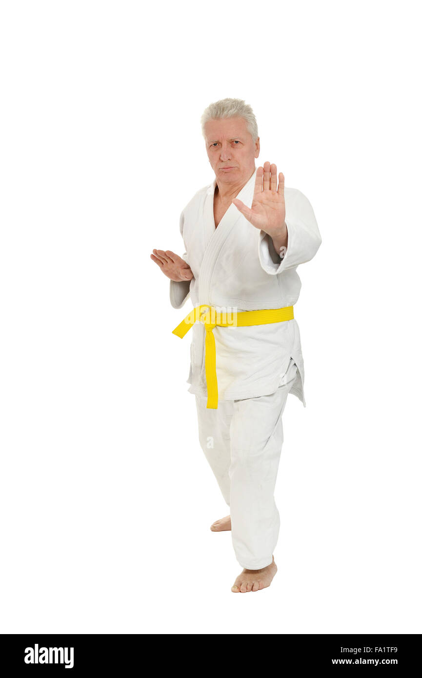 Senior man in karate pose Stock Photo - Alamy