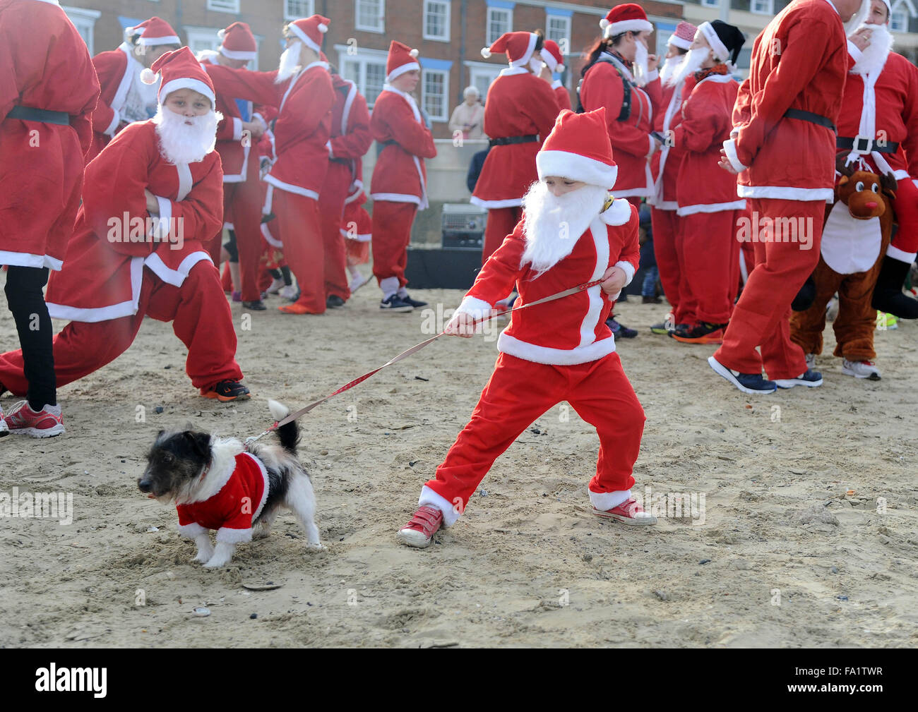 Boy Pulling Dog Leash High Resolution Stock Photography and Images - Alamy