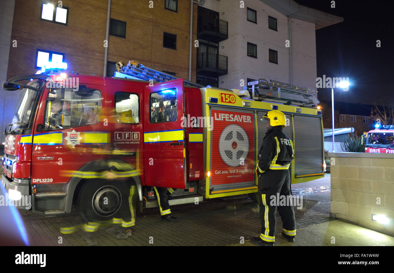 Two appliances from London Fire Brigade attend a flat fire in North ...