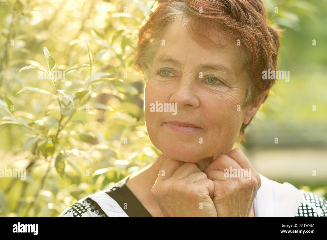 Lady enjoying summer Stock Photo - Alamy