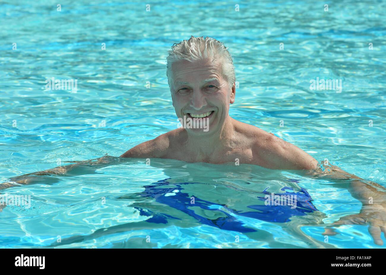 Senior Man in Swimming Pool Stock Photo - Alamy