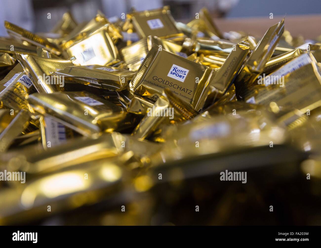 Waldenbuch, Germany. 17th Dec, 2015. Ritter Sport "Goldschatz" mini ...