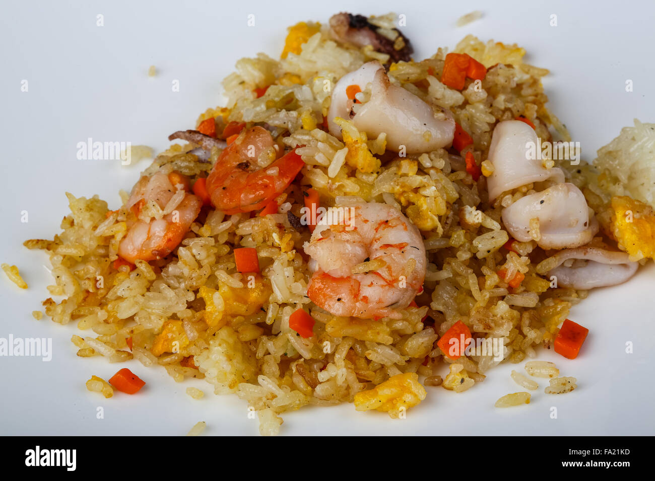 Asian traditional Fried rice with seafood on the wood background Stock ...