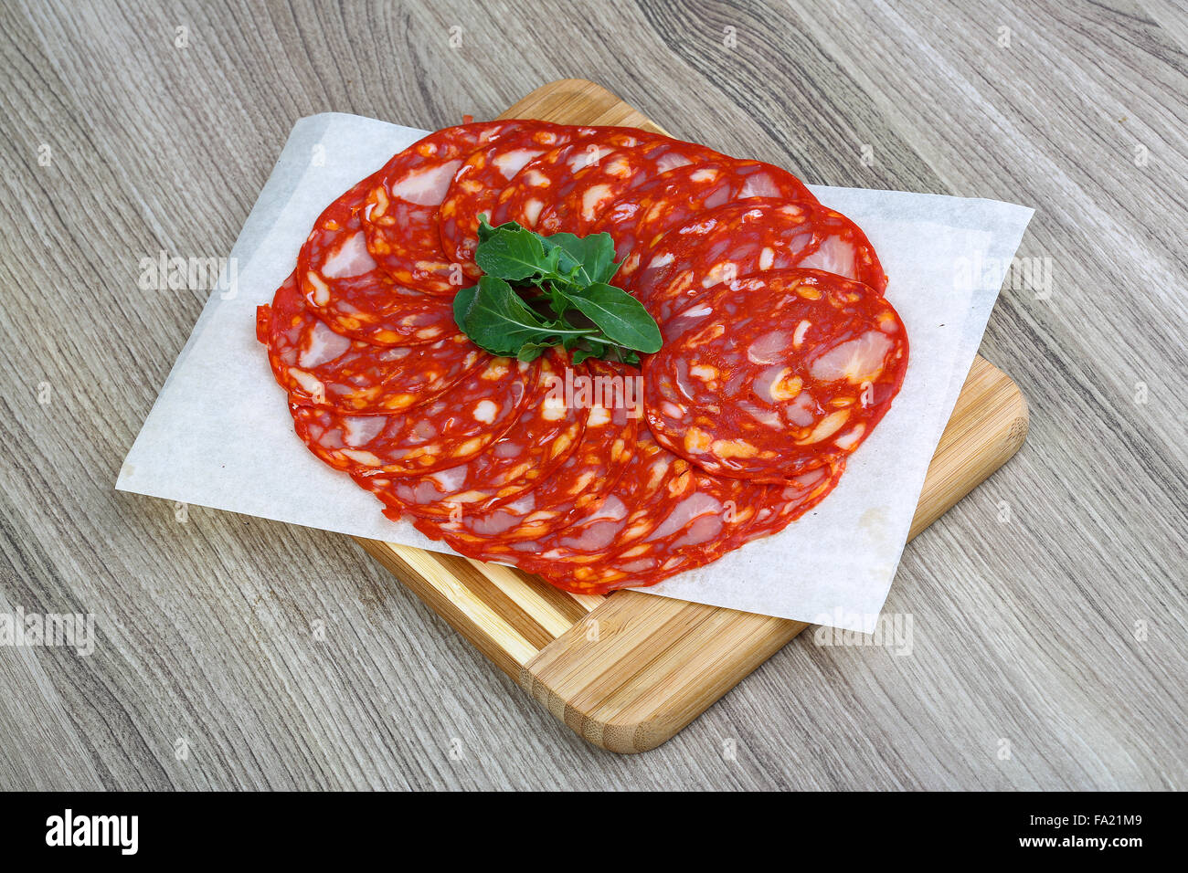 Traditional Spanish salami - Chorizo sausage on the wood background ...