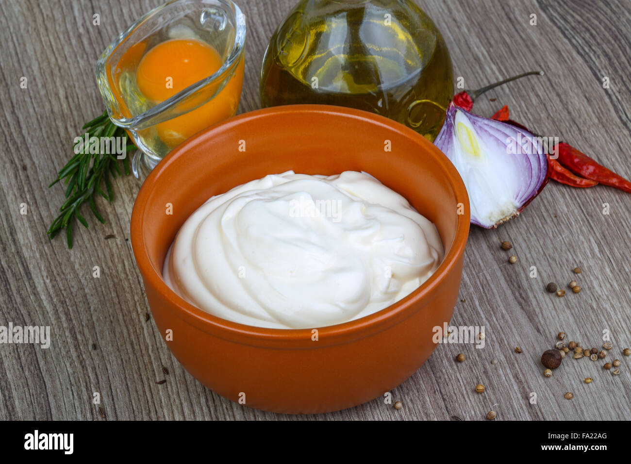 Mayonnaise sauce served raw egg, olive oil and rosemary Stock Photo - Alamy