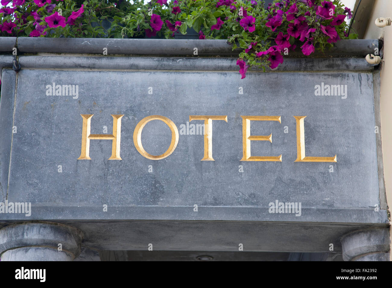 Hotel Sign on Building Facade Stock Photo - Alamy