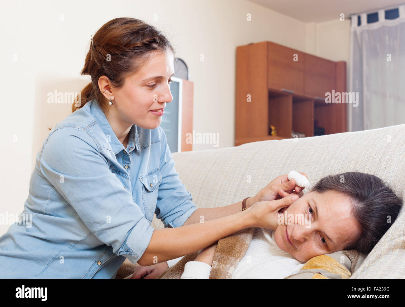 Ear drops adult hi-res stock photography and images - Alamy