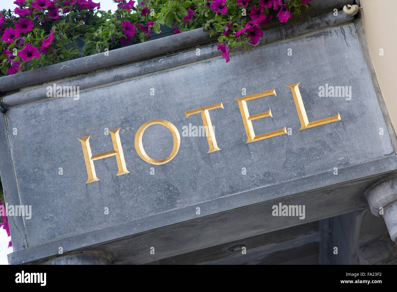 Hotel Sign on Building Facade on a Diagonal Slant Stock Photo - Alamy