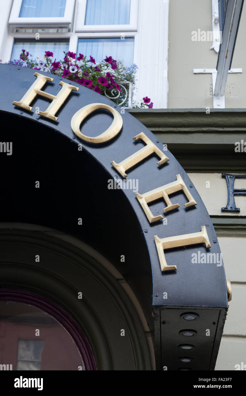 Hotel Sign on Building Facade Stock Photo - Alamy