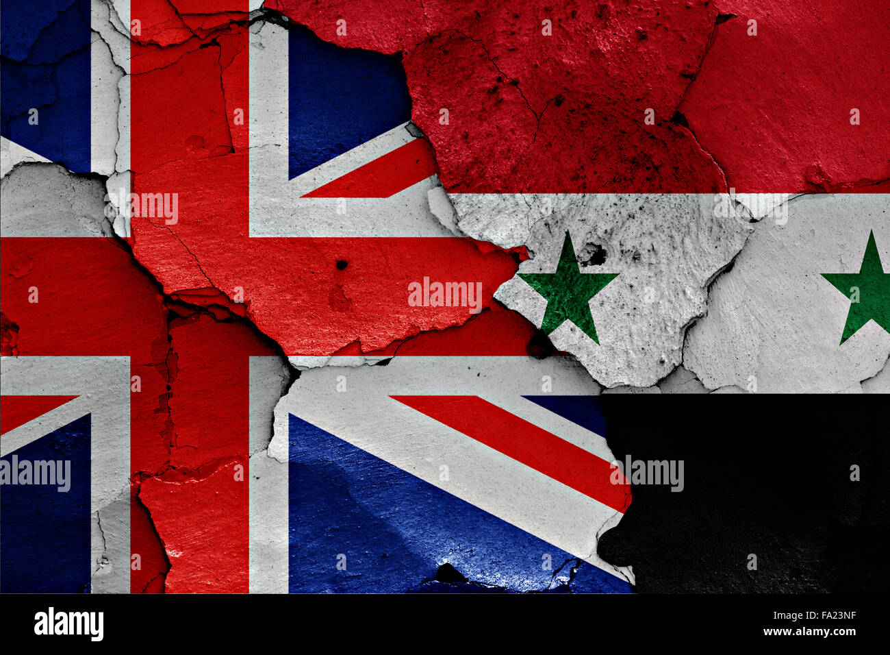 flags of UK and Syria painted on cracked wall Stock Photo - Alamy