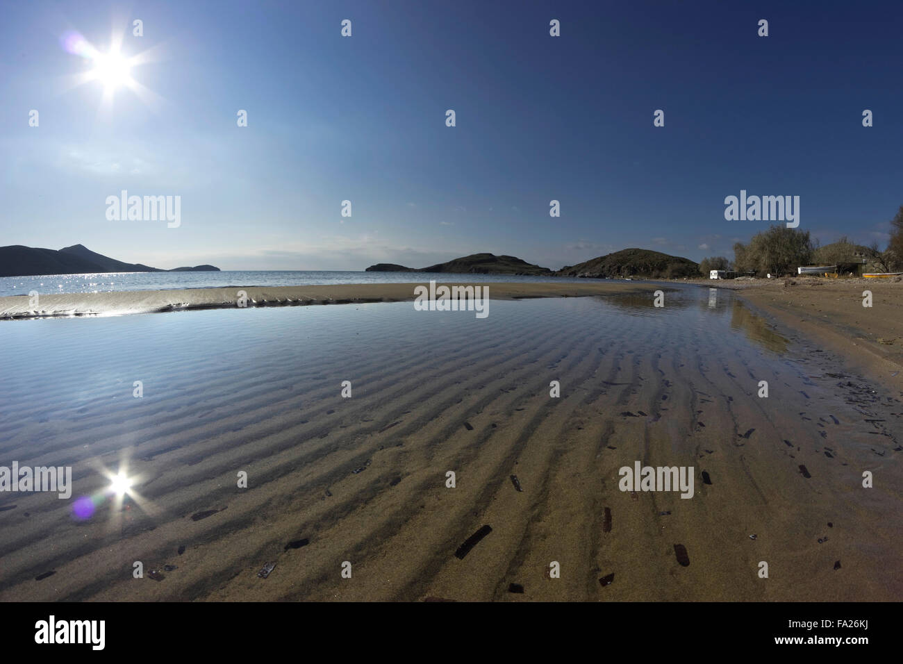 Groovy sand patterns waterscape in Platy /Plati village beach. Lemnos ...