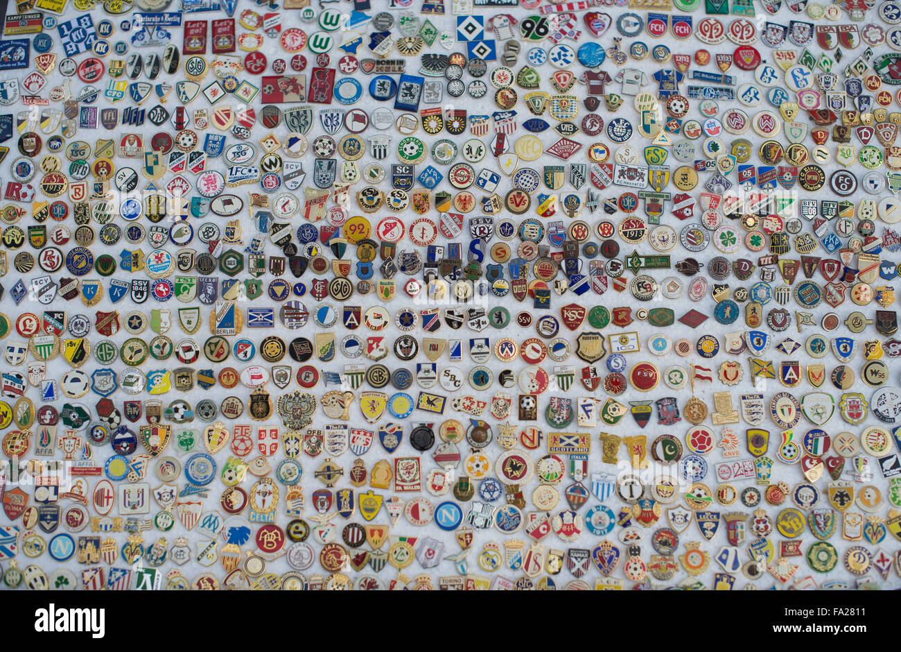 Berlin, Germany. 20th Dec, 2015. Badges for various international and ...