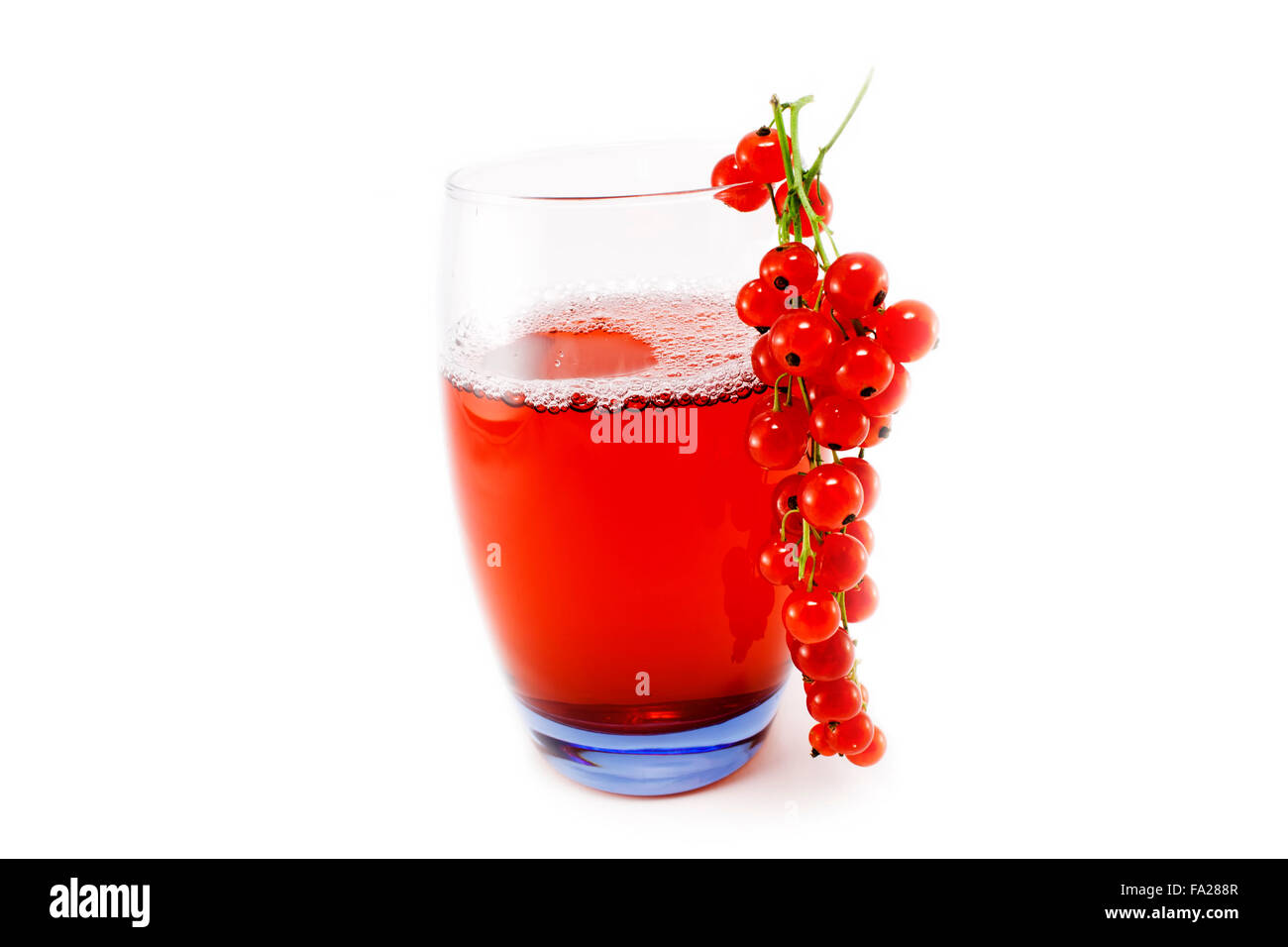 Glass cup with red currant juice isolated on white Stock Photo - Alamy