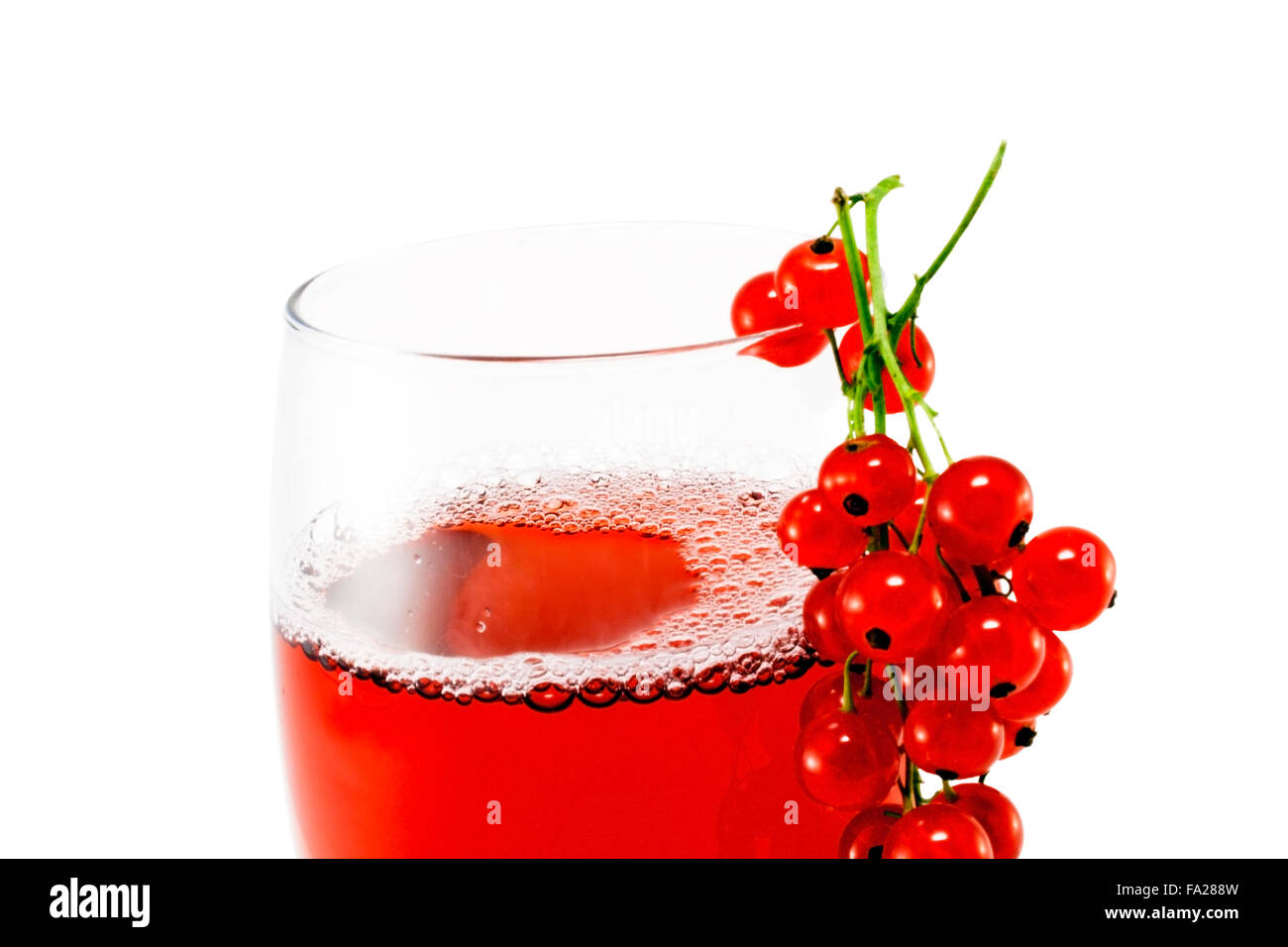 Glass cup with red currant juice isolated on white Stock Photo - Alamy