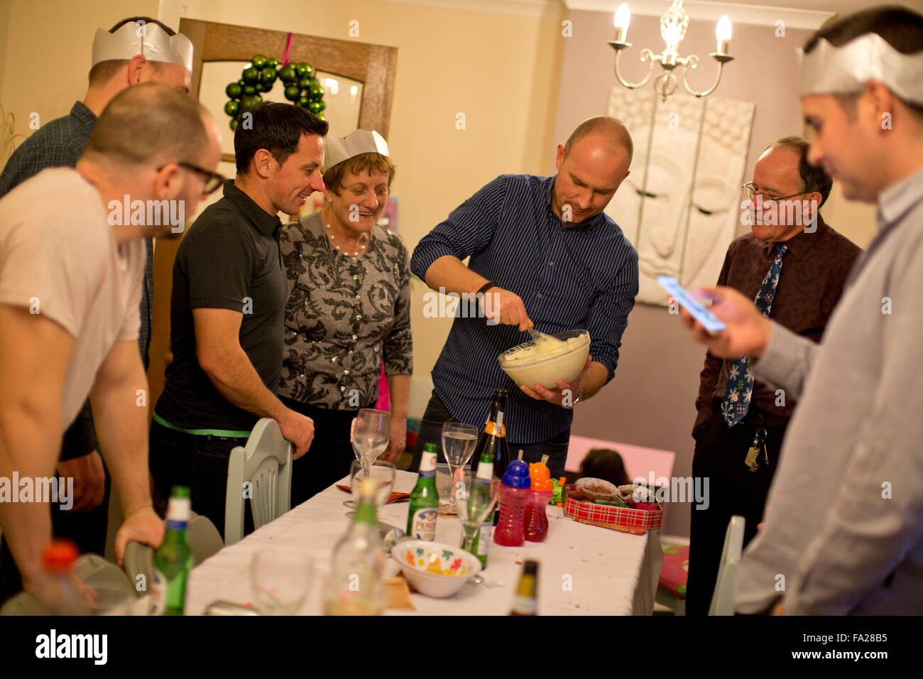 Family gathering at Christmas Stock Photo - Alamy