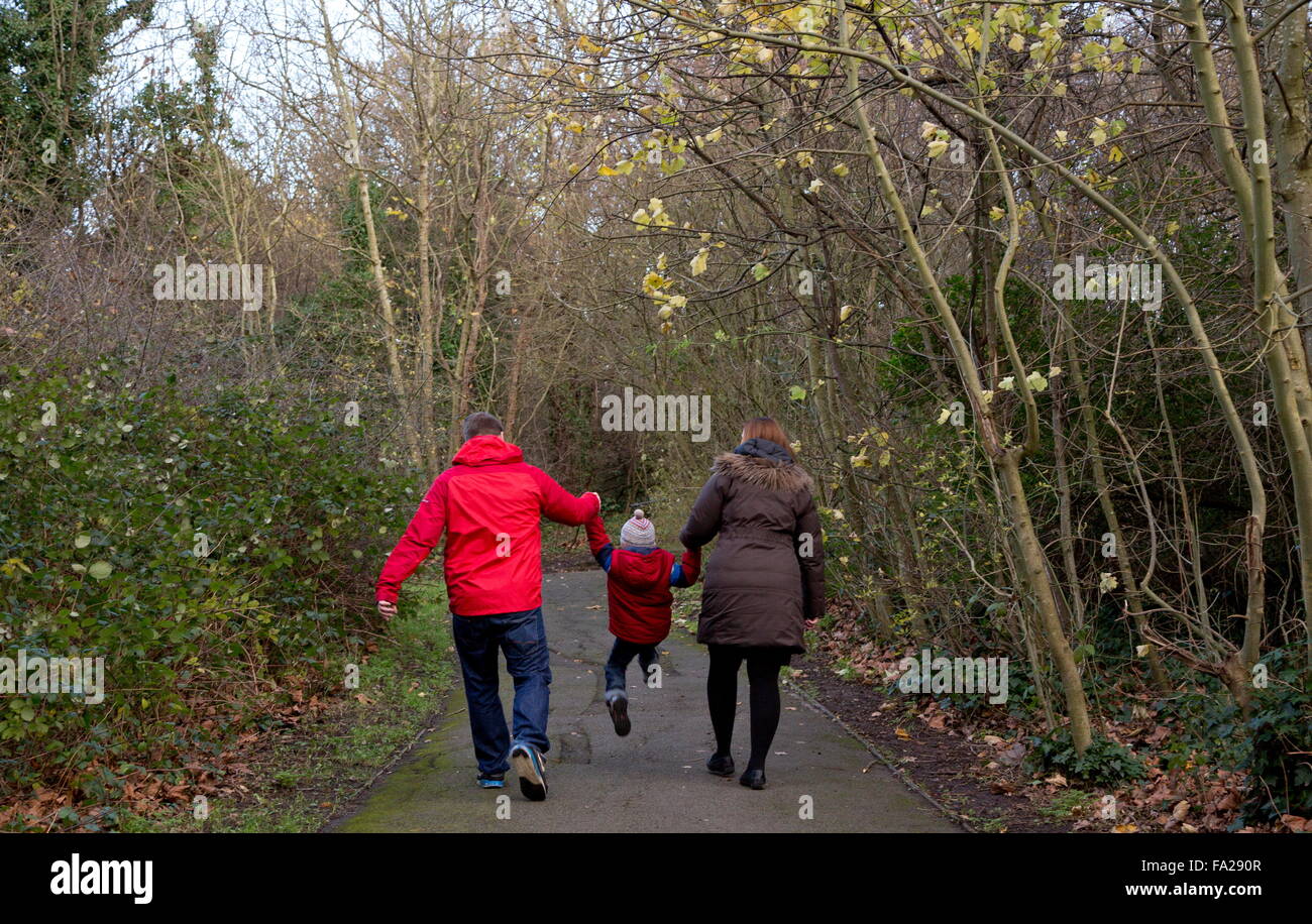 Family out walking in the woods Stock Photo - Alamy
