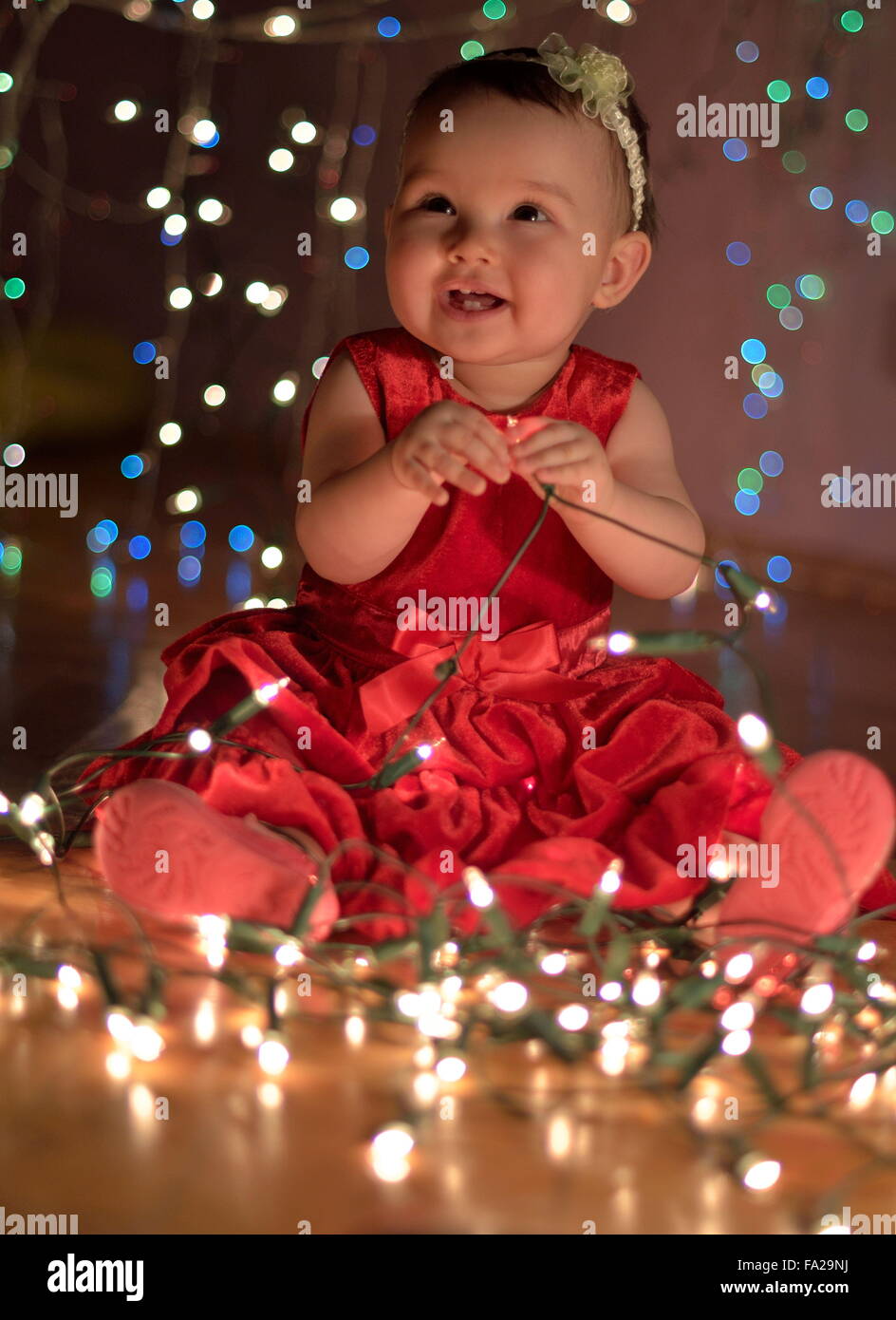 baby playing with led lights Stock Photo - Alamy