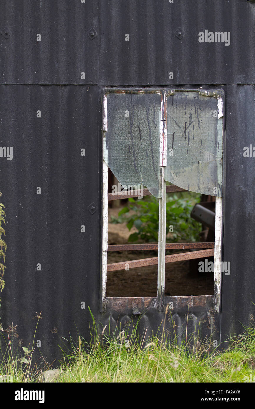 Old barn broken windows for use as a background Stock Photo - Alamy