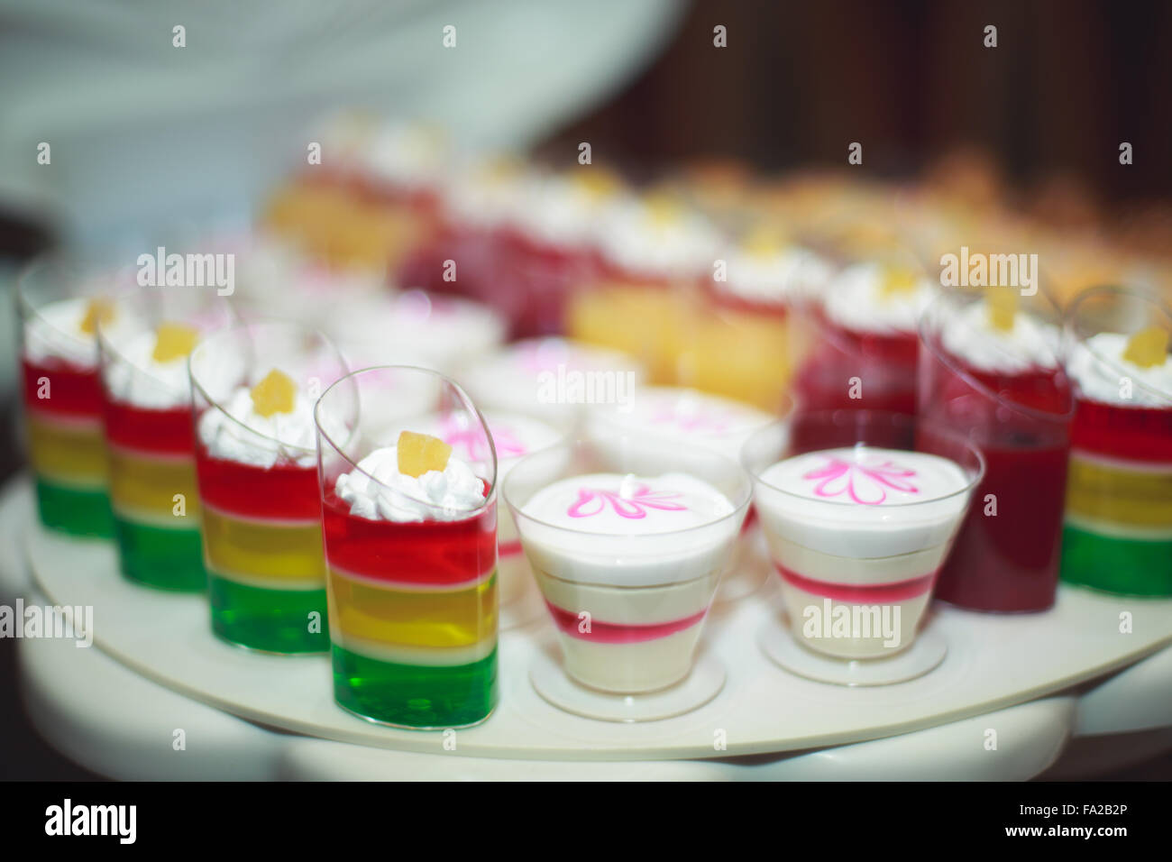 Delicious sweets at wedding candy bar Stock Photo - Alamy
