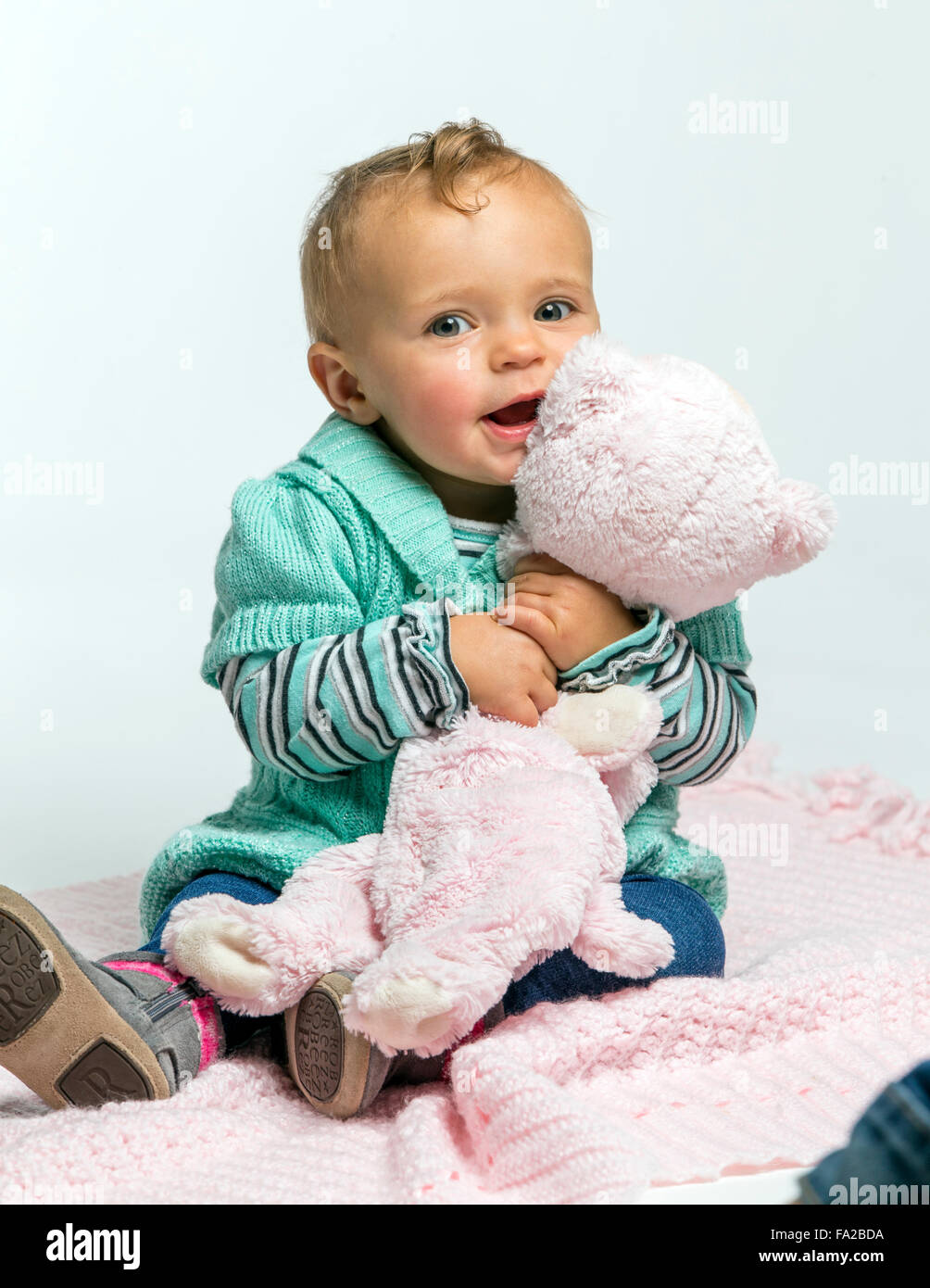 Studio photograph of cute one year old baby girl Stock Photo - Alamy