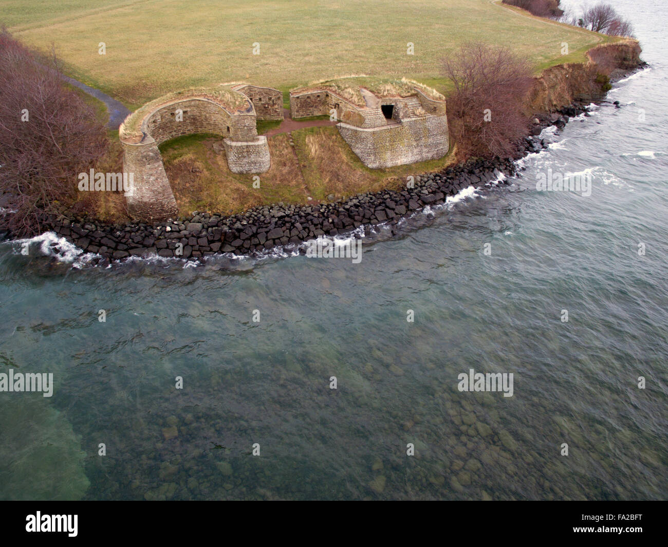 Parts of a castle, most have been reclaimed by erosion Stock Photo - Alamy