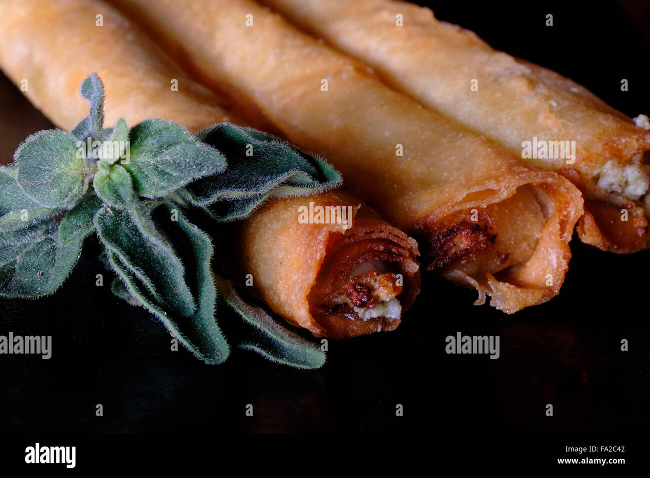 A dish of crunchy Moroccan Cigars which are meat filled crispy wrappers ...