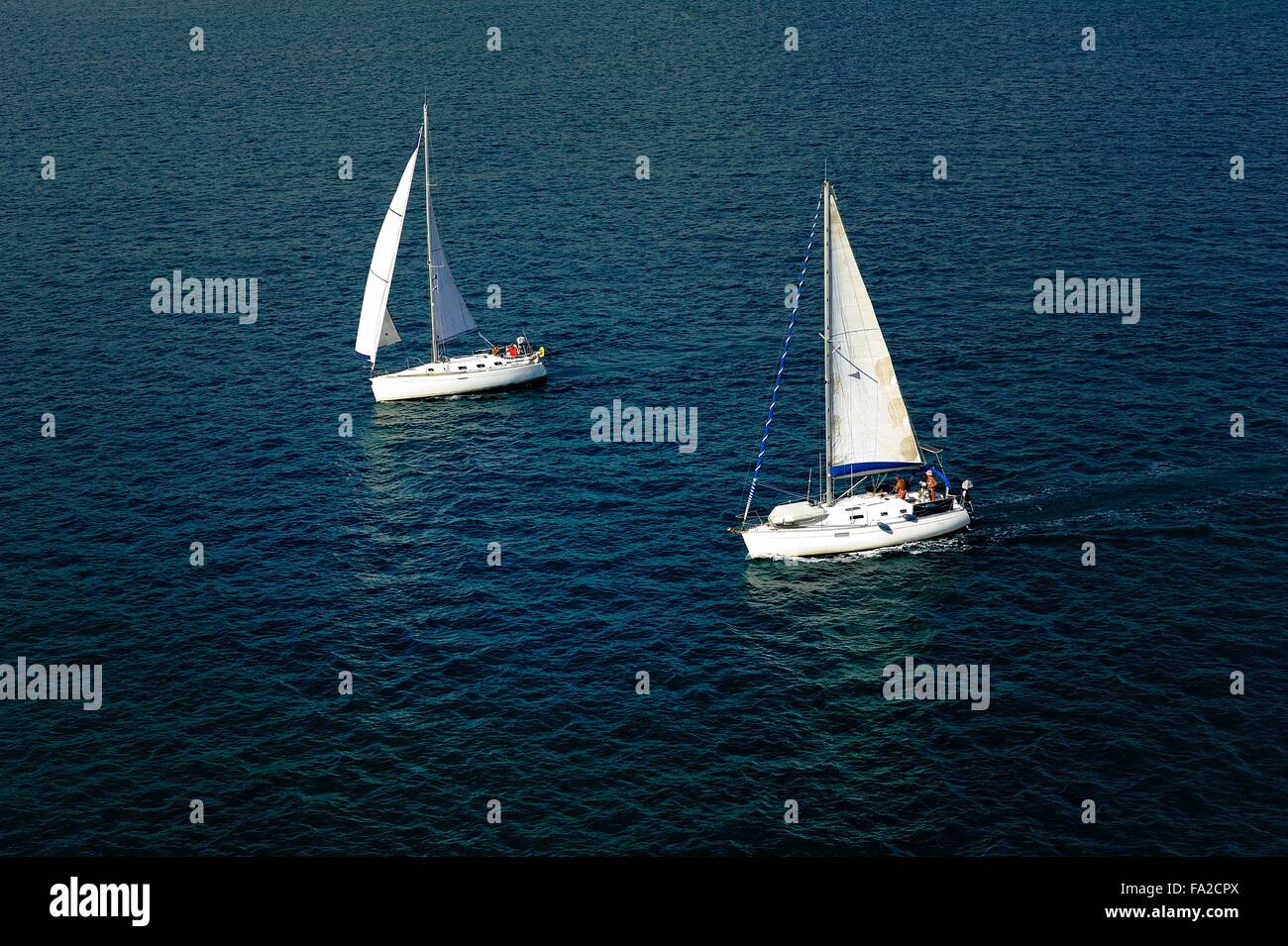 Pair of yacths sailing together Stock Photo - Alamy