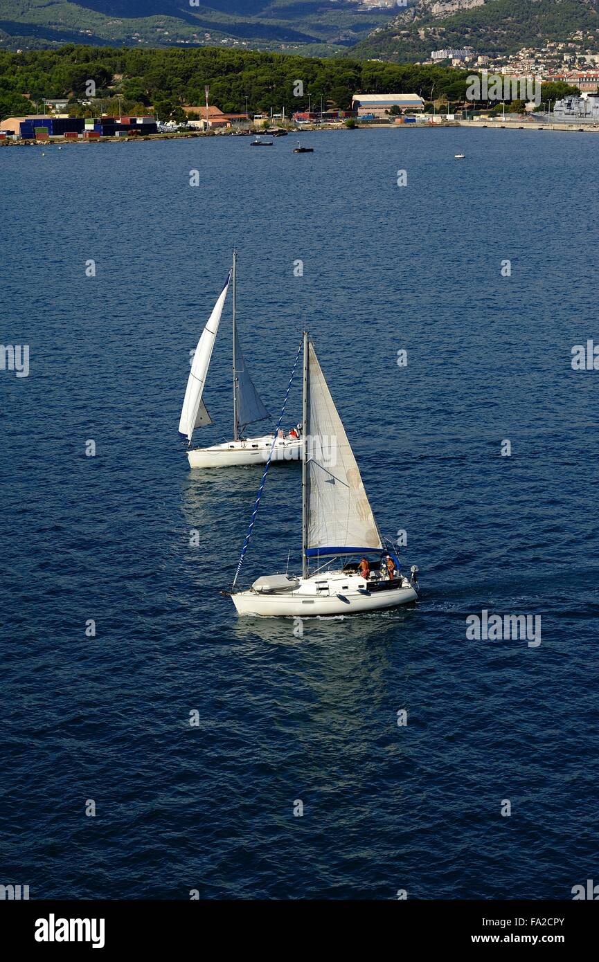 Pair of yachts sailing together Stock Photo - Alamy