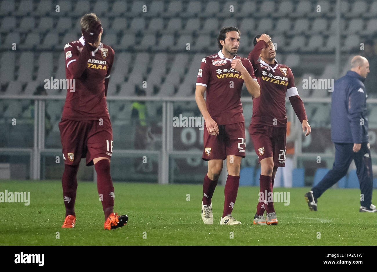Turin, Italy. 20th Dec, 2015. Players of Torino FC are disappointed at ...