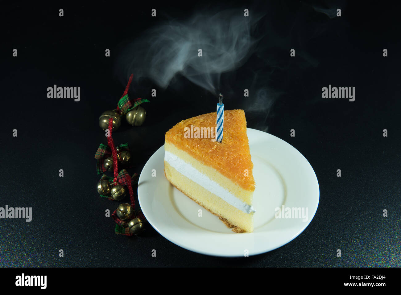 Gold threads cake isolated on background black Stock Photo - Alamy