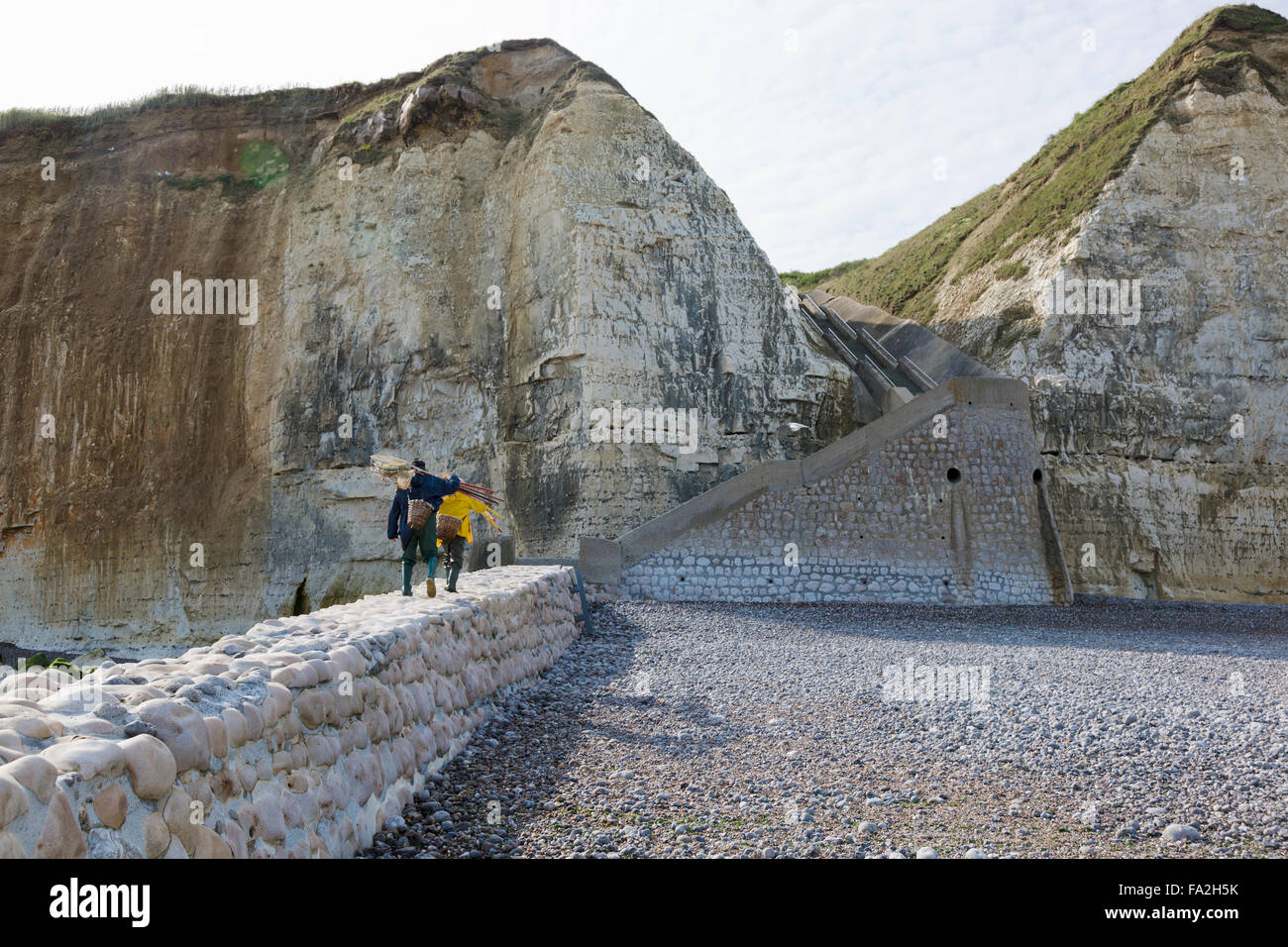 Fishermen on a Normandy beach Stock Photo - Alamy