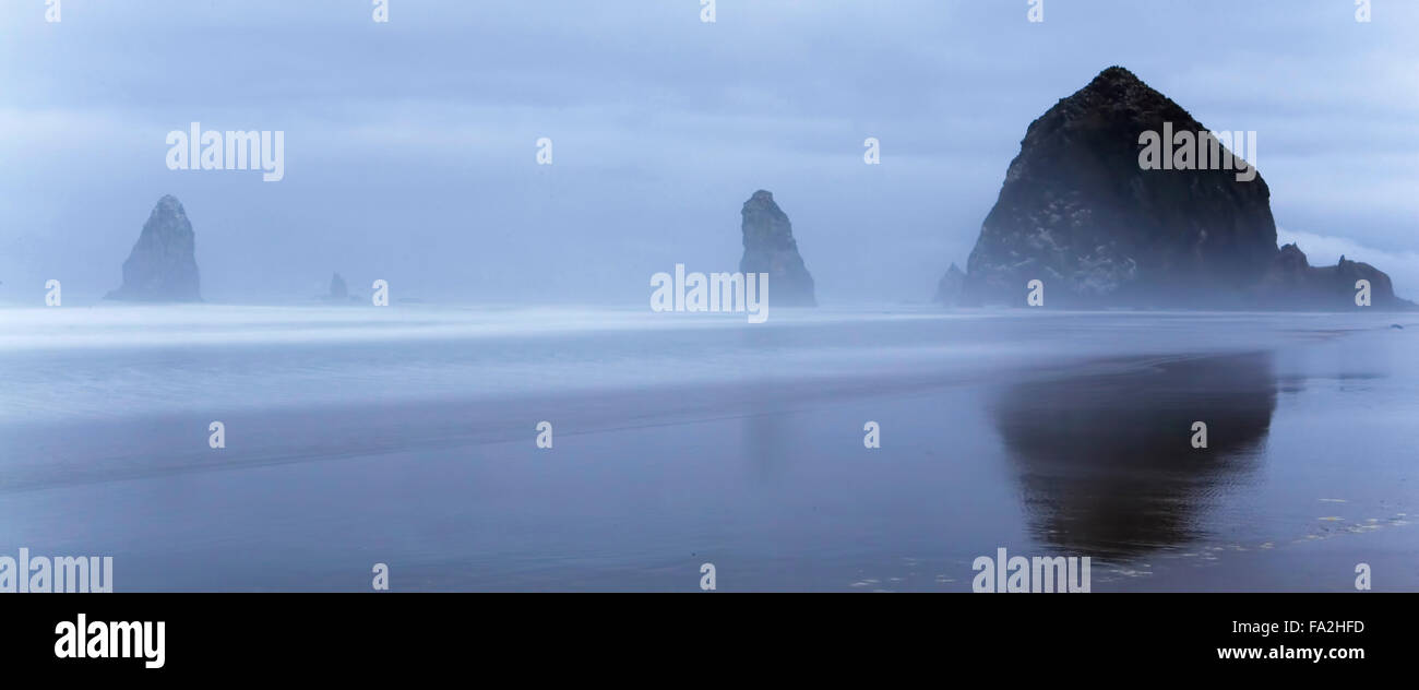 Morning at Haystack Rock in Oregon Stock Photo - Alamy